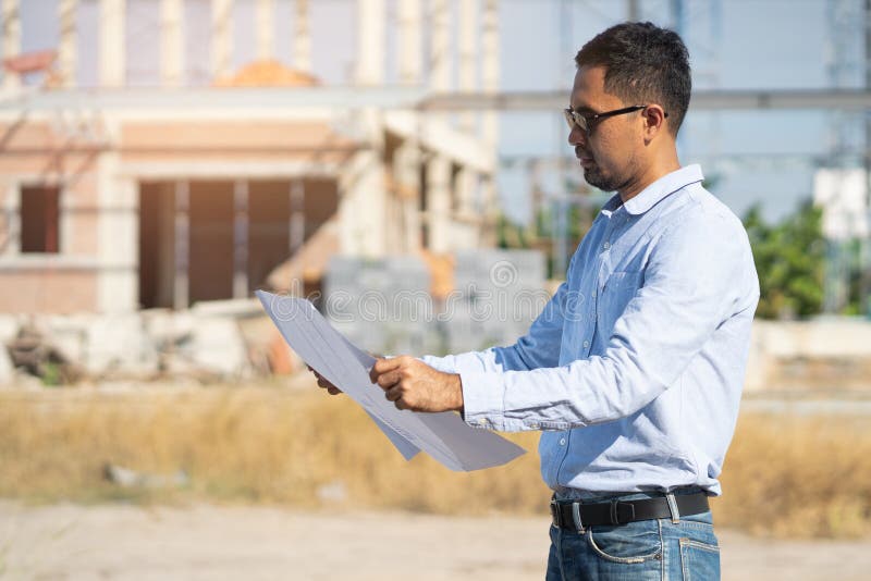 Close Up Inspector Checking Blueprint for Industry Construction Stock ...