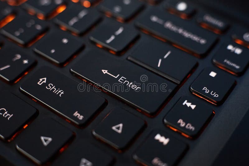Close-up of a Laptop Keyboard with Orange Backlight Stock Photo - Image ...