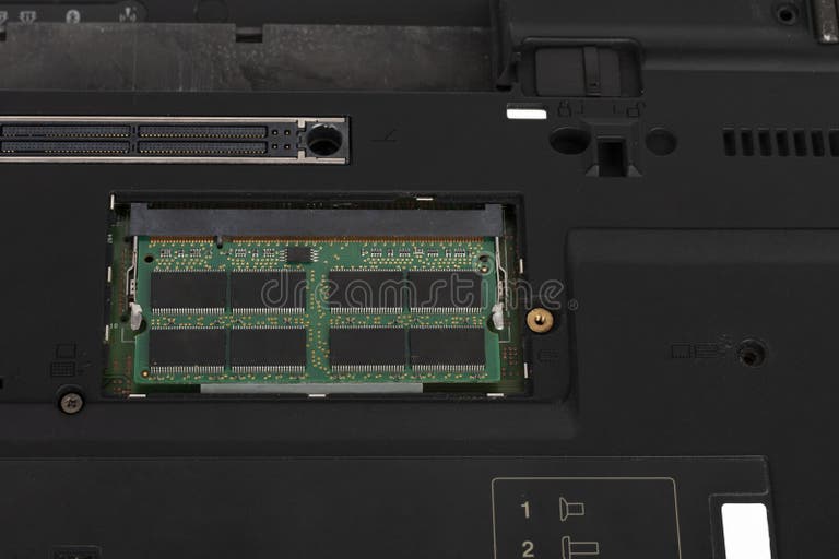 Close Up of Laptop Memory Module on Slot of Motherboard. Underside of ...