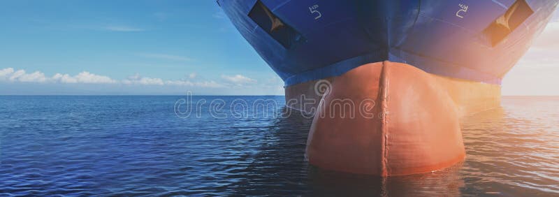 Close Up of Large Blue Merchant Crago Ship in the Middle of the Ocean ...