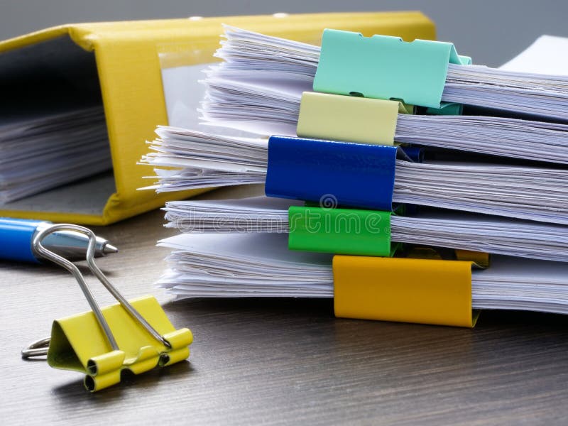 Close-up of Large Stack of Papers with a Report. Accounting and ...