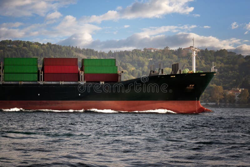 Close-up of a Large Transport Ship with Containers on Deck Sailing ...