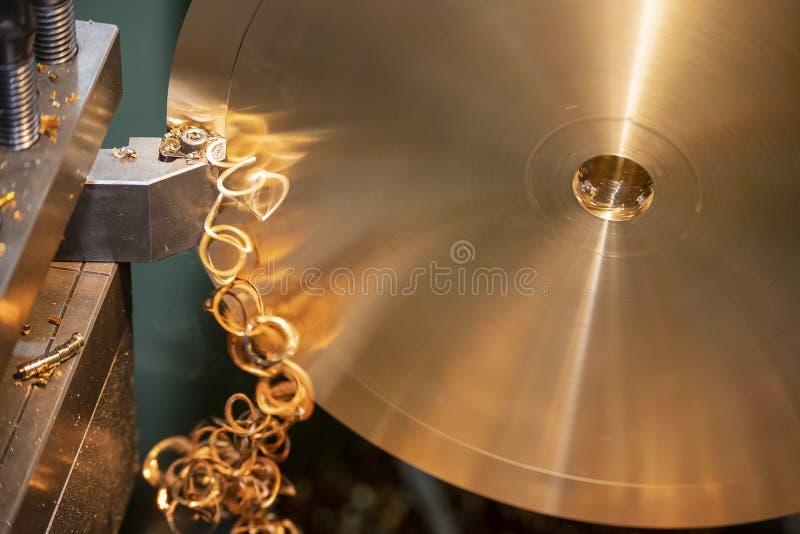 Close-up the Lathe Machine Finish Cutting the Brass Disk Parts by Lathe ...