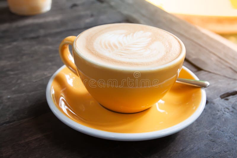 Close Up on Latte Art with Yellow Cup Stock Photo - Image of light ...