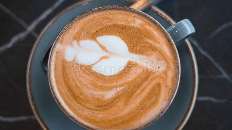 Close-up of a Latte with a Beautiful Pattern, Showcasing Creamy Coffee ...