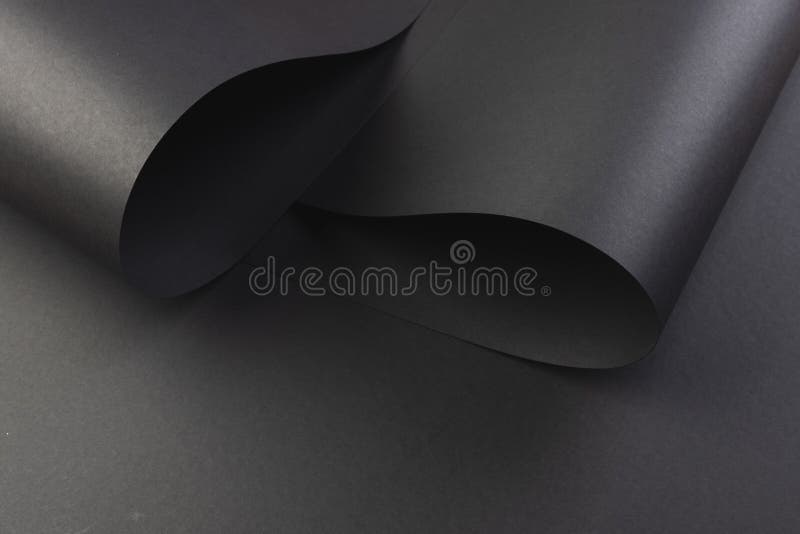 Close Up of Layers of Pieces of Black Paper with Copy Space on Black ...