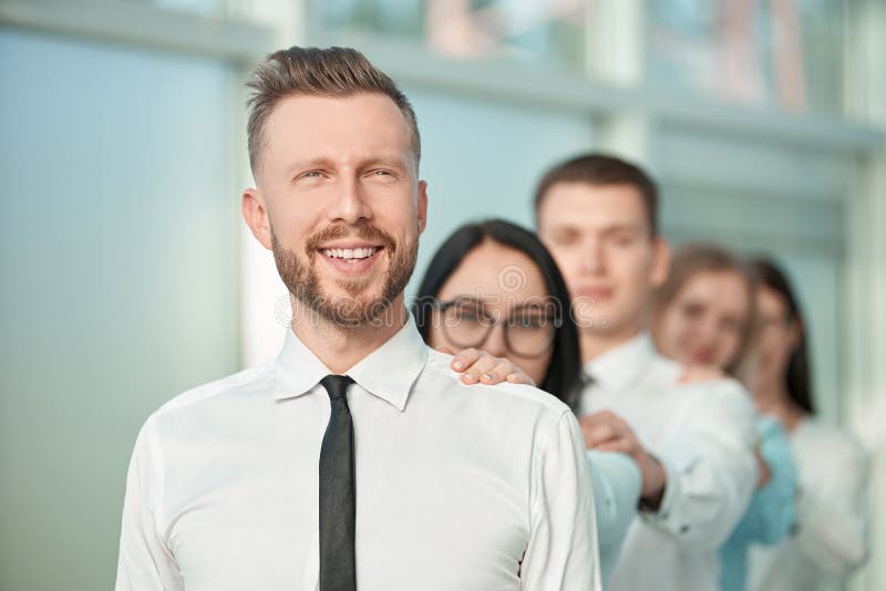 Close Up. Leader and Successful Business Team Standing in a Row Stock ...