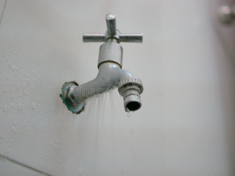 Close Up of Leaking Water Tap at Its Bottom because of High Water ...