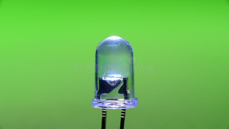 Light-emitting Diode LED Blinking Against Green Background Stock ...