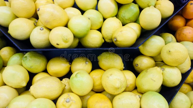 Lemon in display at market stock image. Image of organic - 114542349