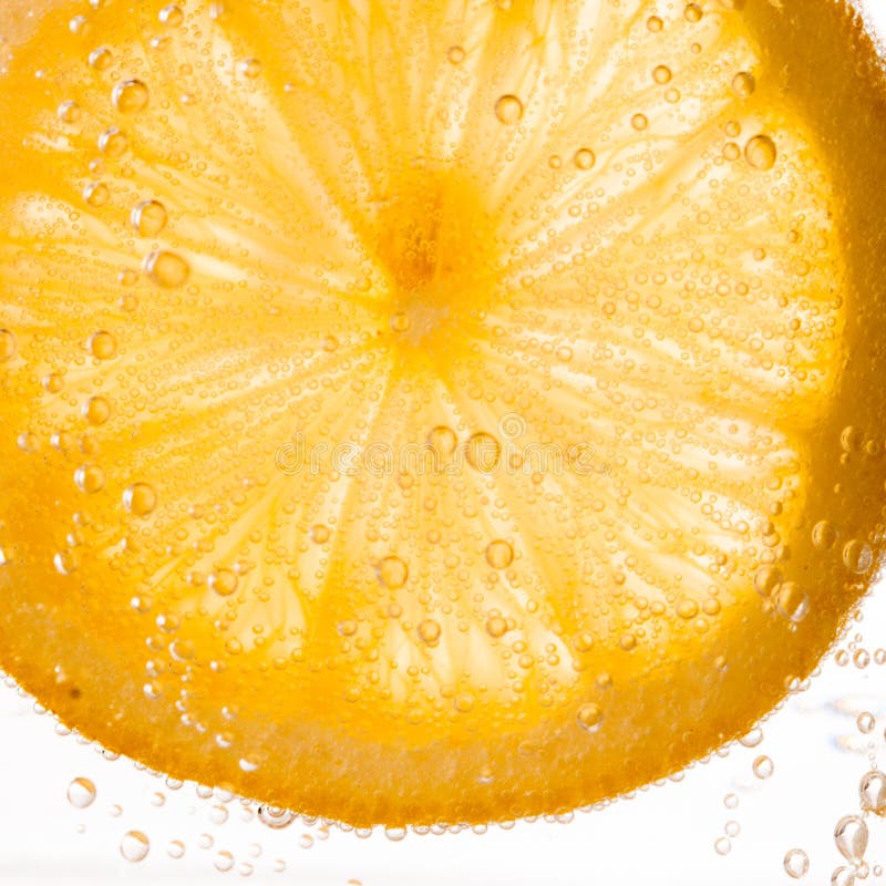 Close-up of lemon slice stock photo. Image of falling - 37903402