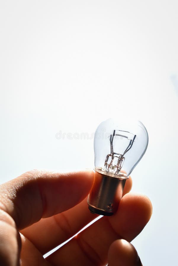 Close Up of Light Bulb on the Hands Stock Image - Image of household ...