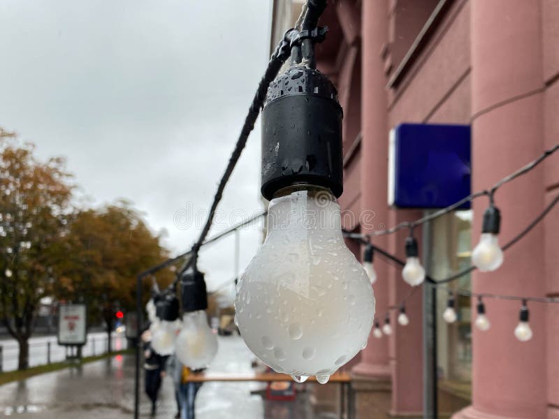 Close-Up of Light Bulb Hanging Against Sky Stock Image - Image of ...