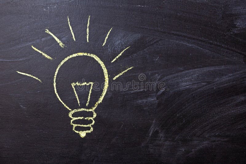 Close Up of a Light Bulb in Yellow Chalk Drawing on Blackboard Stock ...