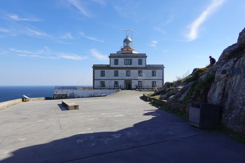 Close Up Lighthouse of Finisterre , with Pilgrim of the Way of Santiago ...