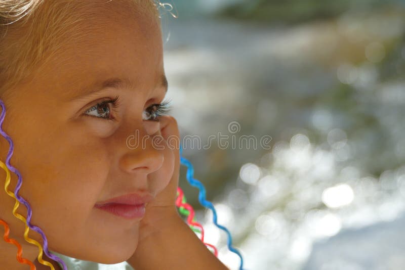 Close Up of a Little Girl with Bokeh Effect Stock Photo - Image of ...