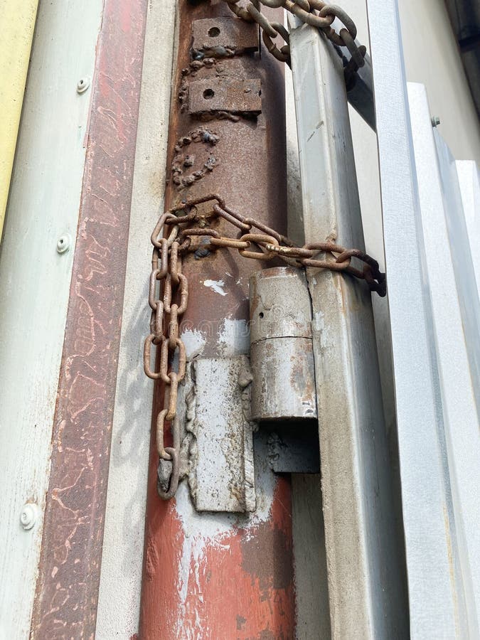 Lock on a Chain on a Rusty Metal Container Stock Photo - Image of ...
