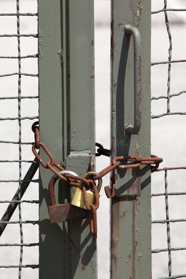 Close up on a locked gate stock image. Image of safety - 20289231