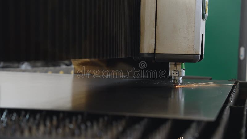 Close Up of an Automatic CNC Laser Cutting Machine Working with Sheet ...