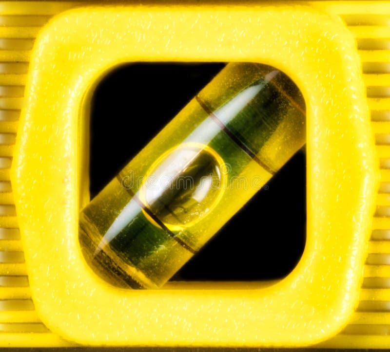 Close Up Macro of Glowing Yellow Level Tool with Bubble in Glass Stock ...