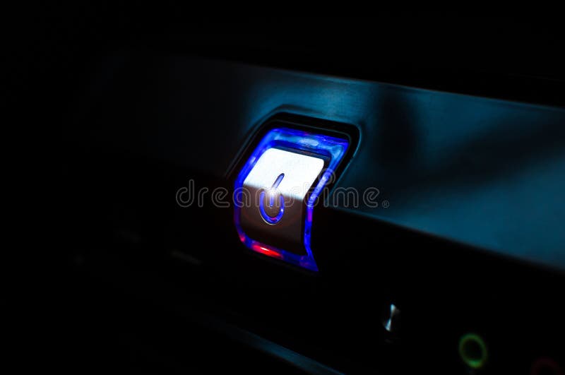 Close Up Macro Shot of the Press the Power Button on Computer. Turn on ...