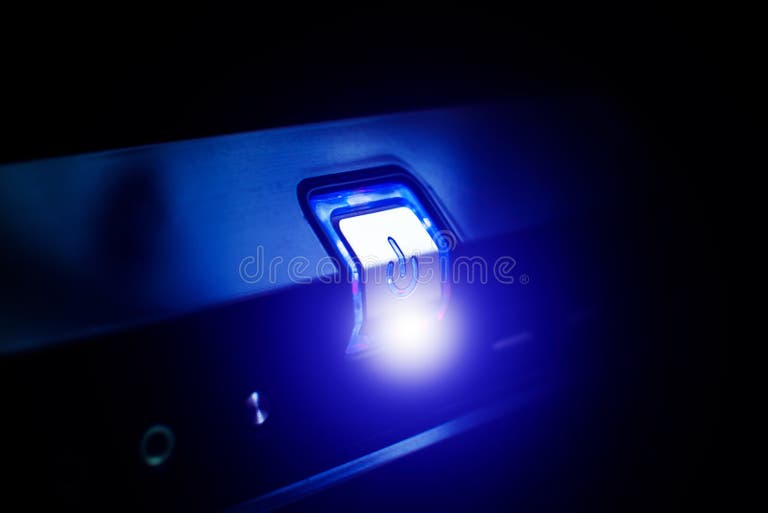 Close Up Macro Shot of the Press the Power Button on Computer. Turn on ...