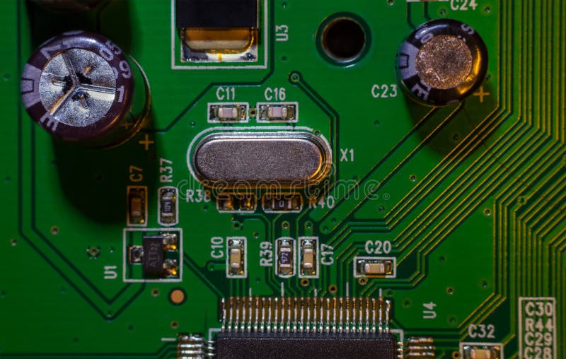 A Close-up Macro Shot of a Quartz Resonator for Controlling a Computer ...