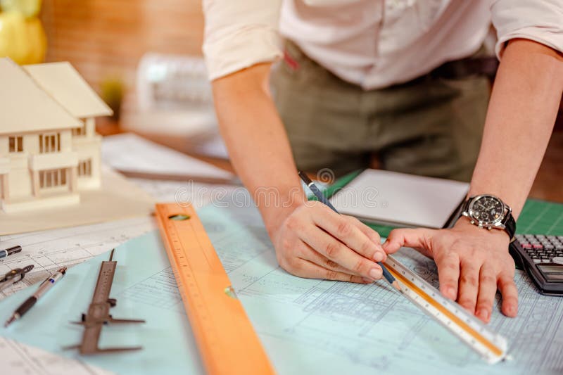 Close Up of Male Architect Hands Measuring and Making Model House on ...