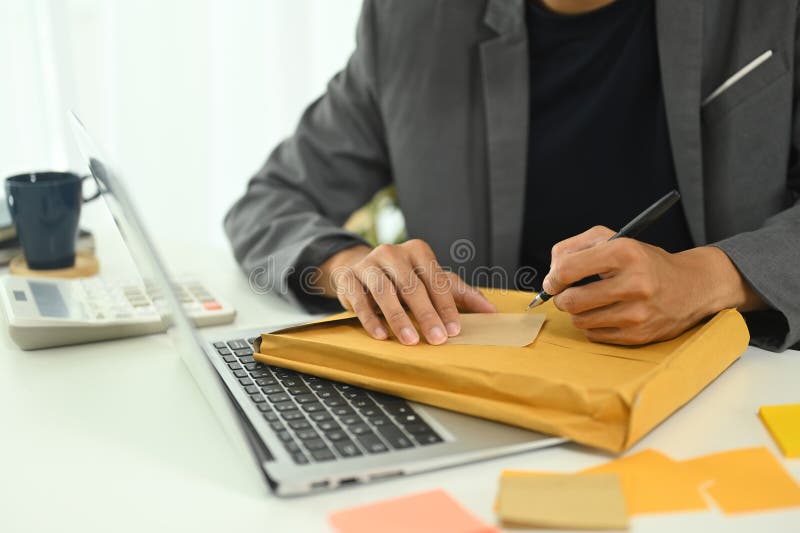 Close Up Male Employee Writing Tasks on Adhesive Note Stock Image ...