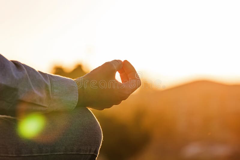Close-up of Male Hand in Meditation Pose in Warm Sunset Light Stock ...