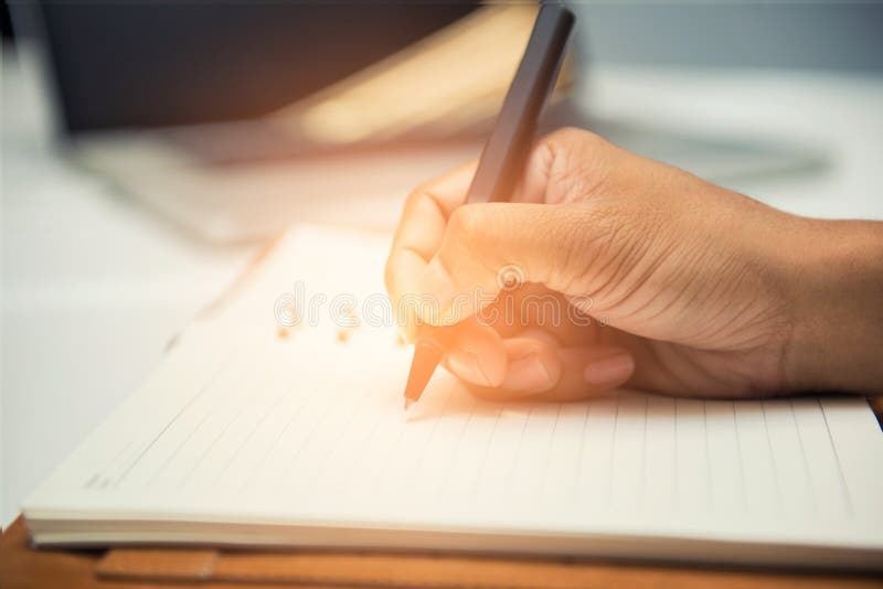 Close-up of Male Hand with Pen Making Notes during Conference Stock ...