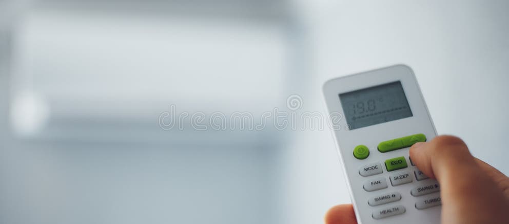 Close-up of Male Hand Using Remote Control of Split Air Conditioner ...