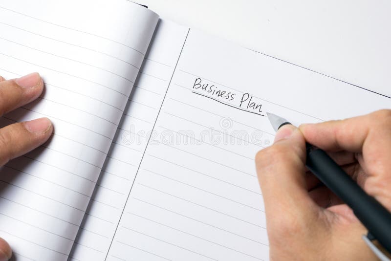 Close-up of Male Hand Writing Down Business Plan Stock Photo - Image of ...
