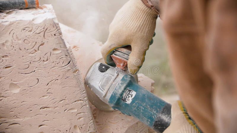 Close-up of Male Hands Grinding a Stone. a Man Creating a Stone ...