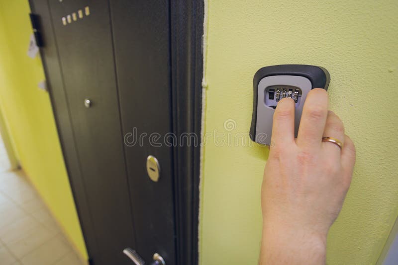 Close Up of Male Hands Holding Combination Home Lock. Stock Photo ...