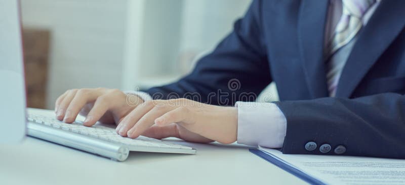 Male Hands Typing on Desktop Computer Keyboard in Office. Stock Photo ...