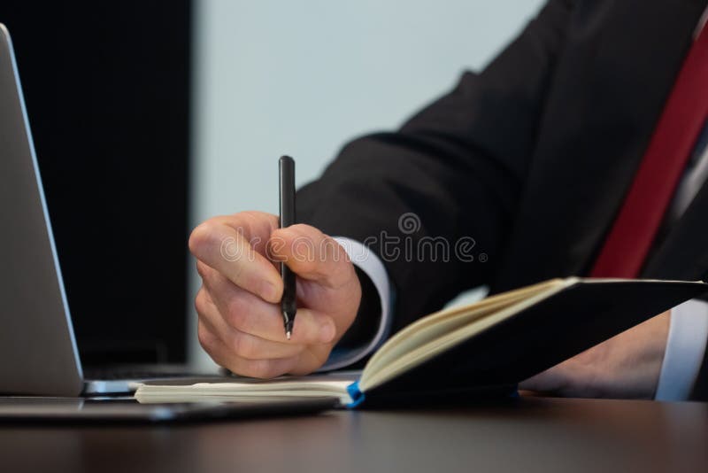 Close-up of Male Hands Writing Down Data with Pen Stock Image - Image ...