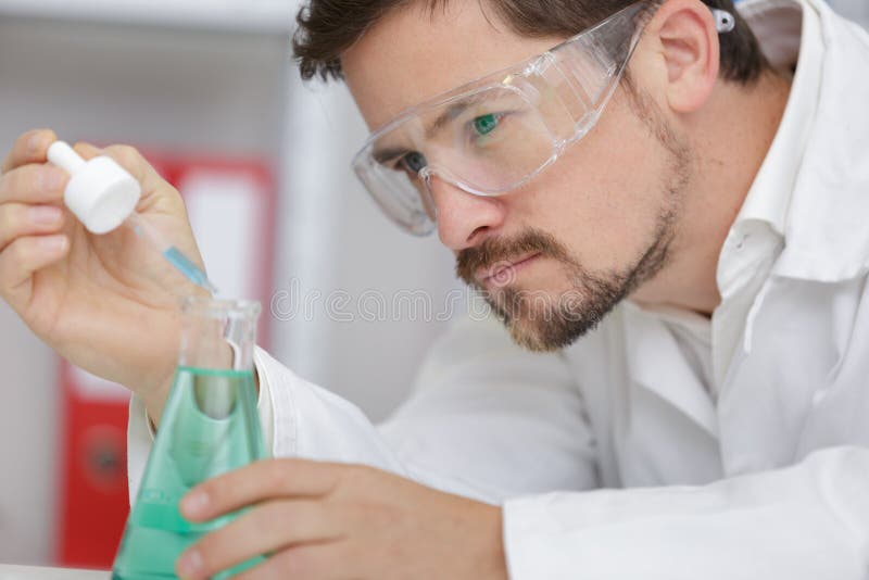 Close Up Male Lab Technician Stock Image - Image of busy, standing ...