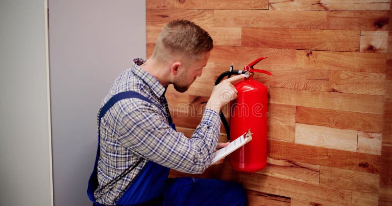 Close-up of Male Professional Checking a Fire Stock Image - Image of ...