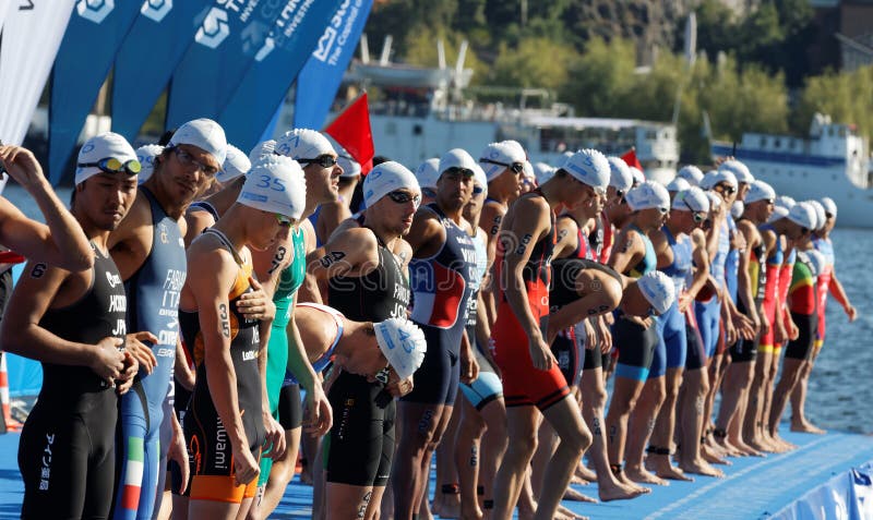 Male Swimming Coach Watching His Swimmer Practice Editorial Stock Image