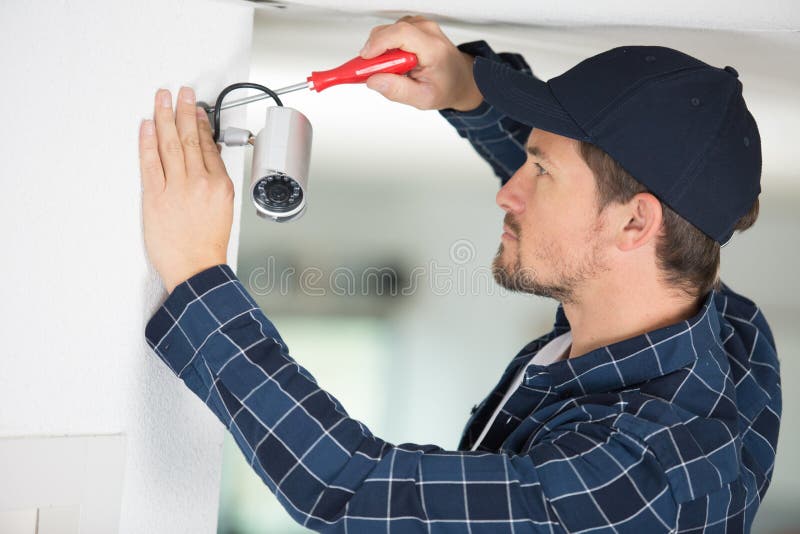 Close Up Male Technician Fixing Cctv Camera on Wall Stock Image - Image ...