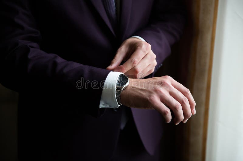 Close-up of a Man Adjusting His Watch in a Dark Suit Stock Image ...
