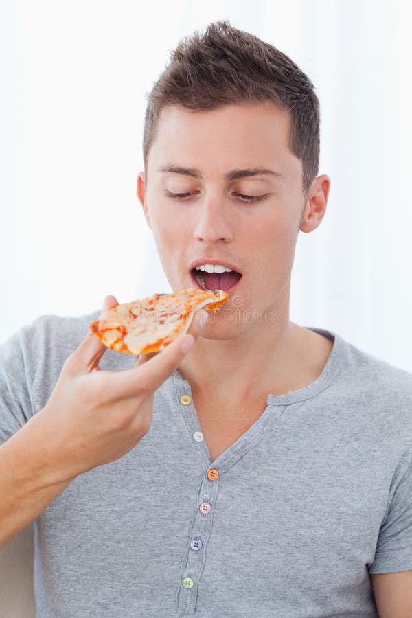 Close Up of a Man As he is about To Eat the Slice of Pizza he is Stock ...