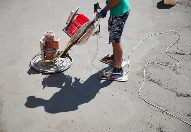 Construction Worker Using Power Trowel Machine Outdoors. Stock Image ...