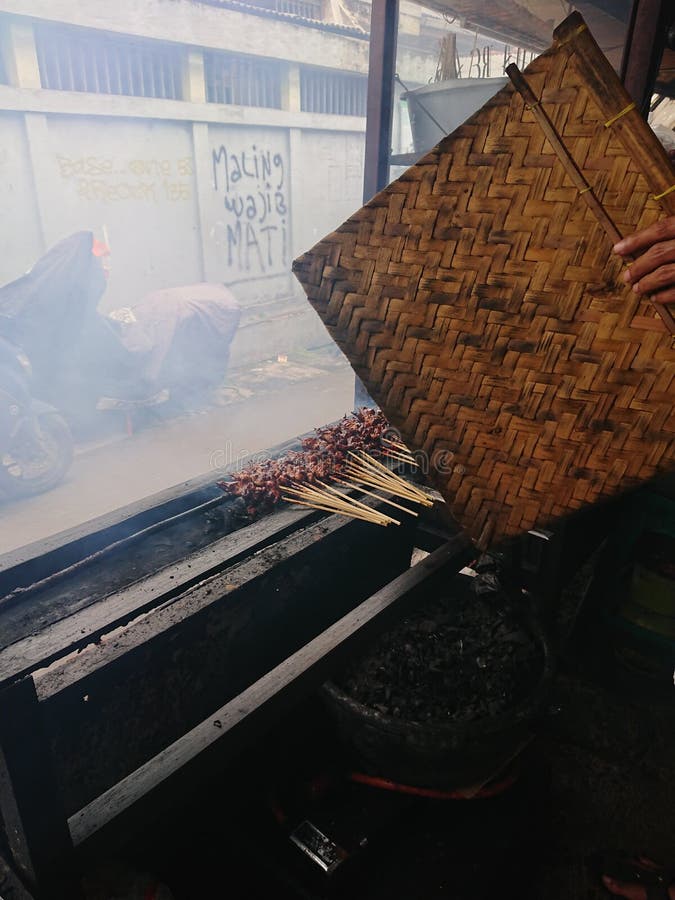 Close Up Man Burning Chicken Satay or Sate Editorial Image - Image of ...