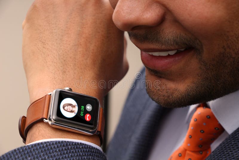 Close Up of Man Calling on His Smart Watch Stock Photo - Image of black ...