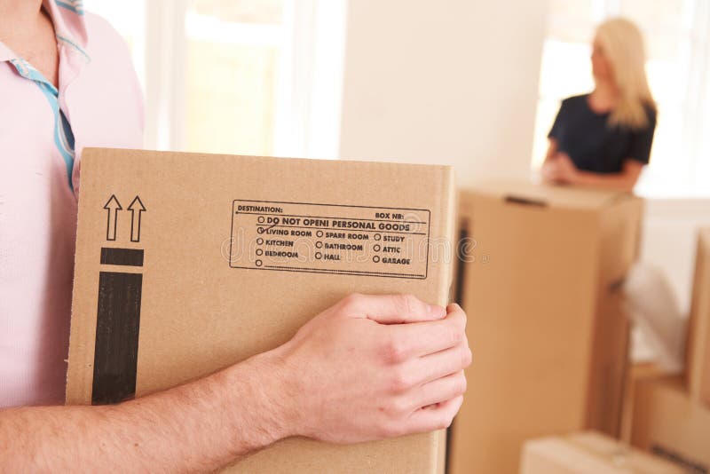 Close Up of Man Carrying Box into New Home Stock Image - Image of ...