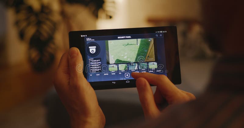 Man Checking Security Camera through Home Hub Stock Video - Video of ...