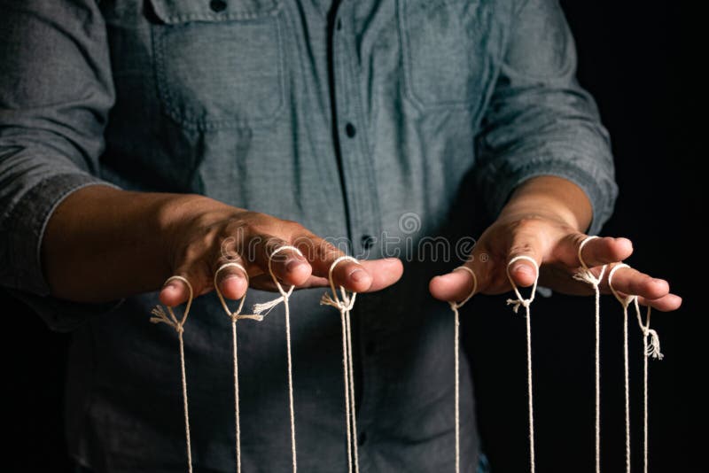 Close-up of Man Controls the Puppet with Fingers Stock Photo - Image of ...