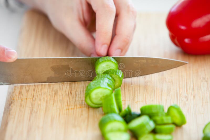 Close-up of a Man Cutting Vegetables in Kitchen Stock Image - Image of ...